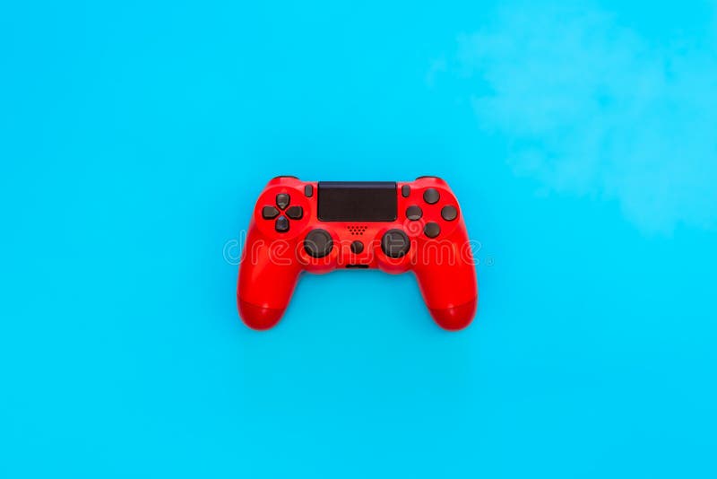 Modern Red Gamepad on a Blue Background, Flat Lay, Close Up. Stock ...