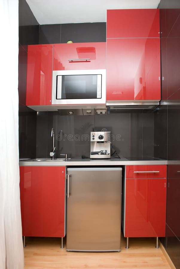 Modern red kitchen stock image. Image of pavement, cupboard - 21603287