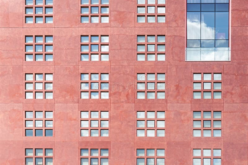 Modern Red Stone Wall with Many Windows Stock Photo - Image of blue ...