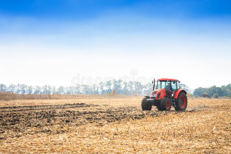 Modern Red Tractor Working on the Field Stock Image - Image of ground ...
