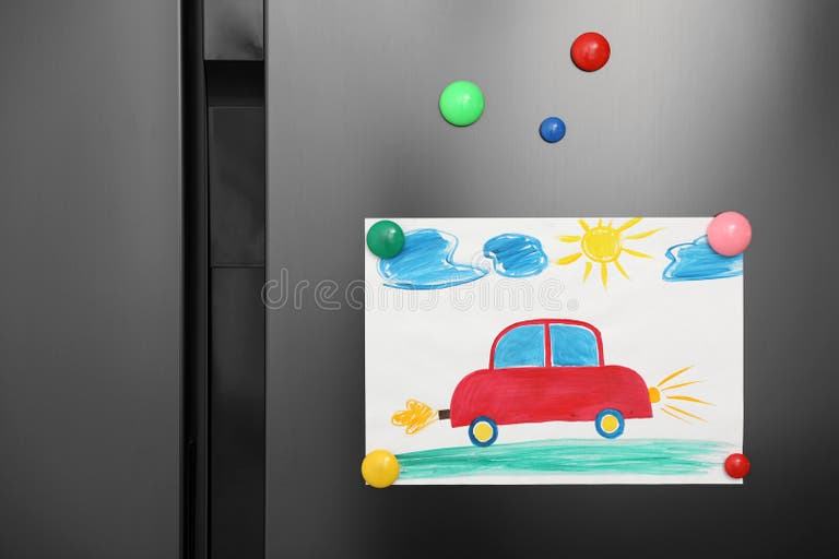 Refrigerator with Child`s Drawing and Magnets Stock Photo - Image of ...