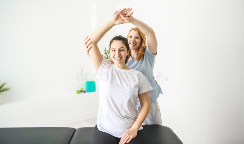 Modern Rehabilitation Physiotherapy at Work with Client Stock Image - Image of chiropractor ...