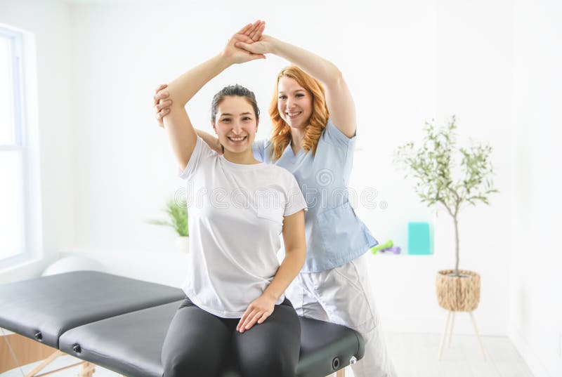 Modern Rehabilitation Physiotherapy Woman Worker with Woman Client Stock Image - Image of heal ...