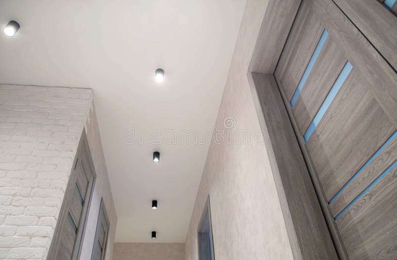 Modern Renovation and Design in the Hallway. Black LED Spotlights on ...