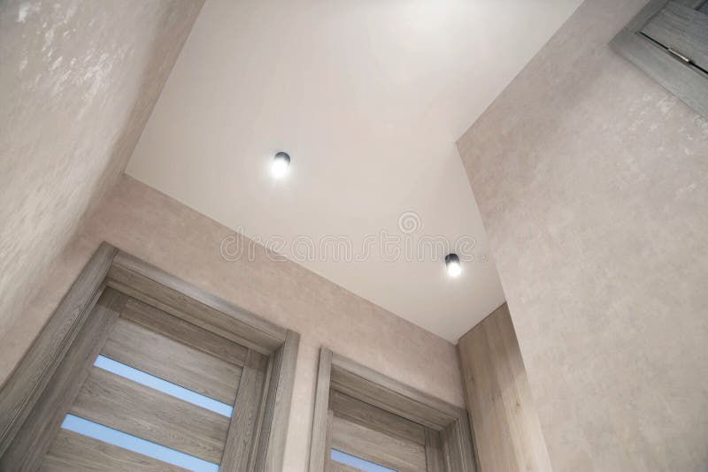 Modern Renovation and Design in the Hallway. Black LED Spotlights on ...