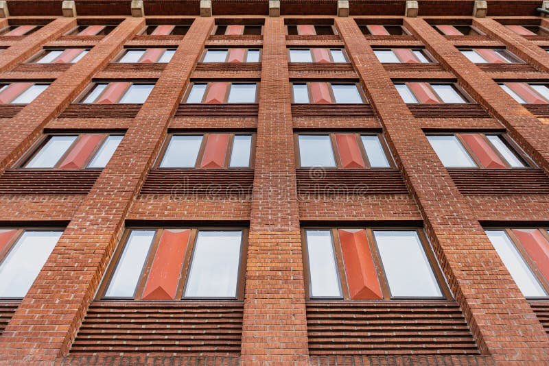 Modern Residential Building Features a Facade Made of Orange Firebricks ...