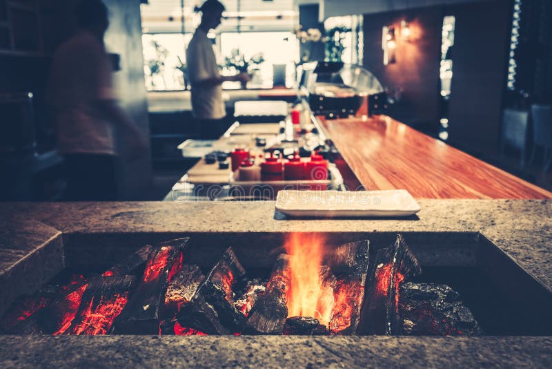Modern Restaurant with Fireplace Stock Image - Image of persons ...