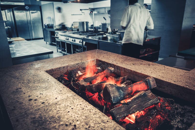 Modern Restaurant with Fireplace Stock Photo - Image of flambe, dinner ...