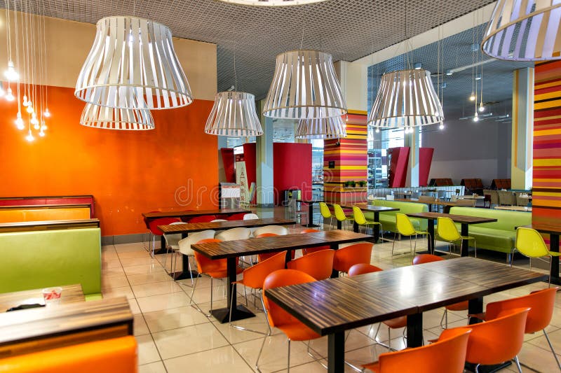 Modern Restaurant Interior with Bright Red and Green Design Stock Photo ...