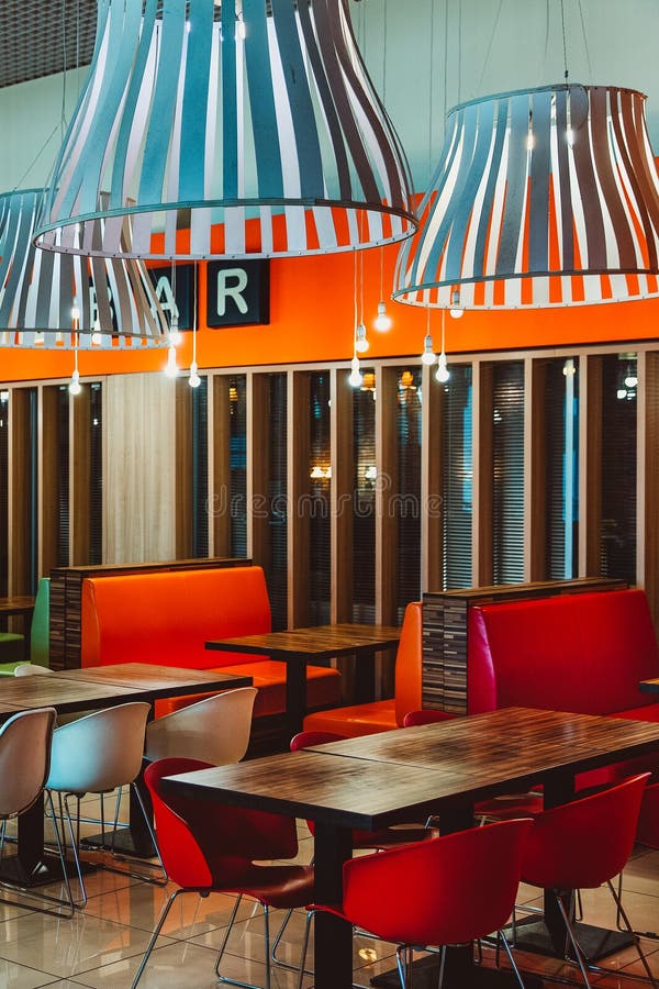 Modern Restaurant Interior with Bright Red and Green Design Stock Image ...
