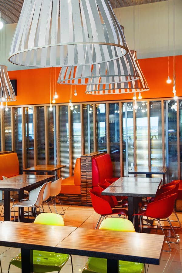 Modern Restaurant Interior with Bright Red and Green Stock Image ...