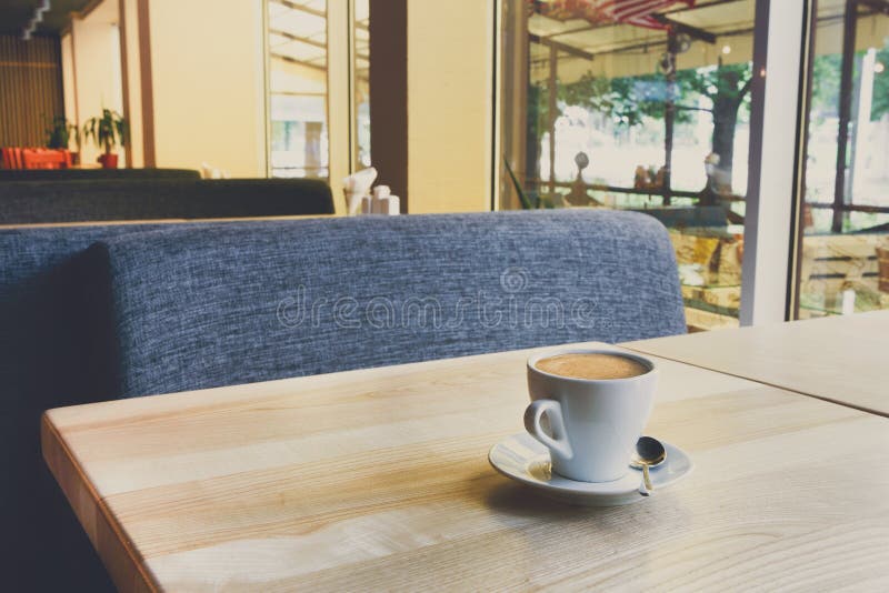 Modern Restaurant Interior, Coffee Cup on Table Stock Photo - Image of ...