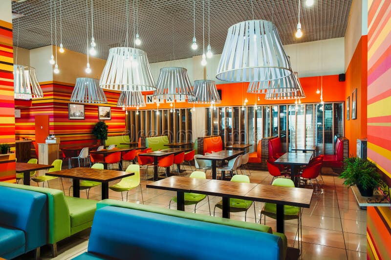 Modern Restaurant Interior with Bright Red and Green Design Stock Image ...