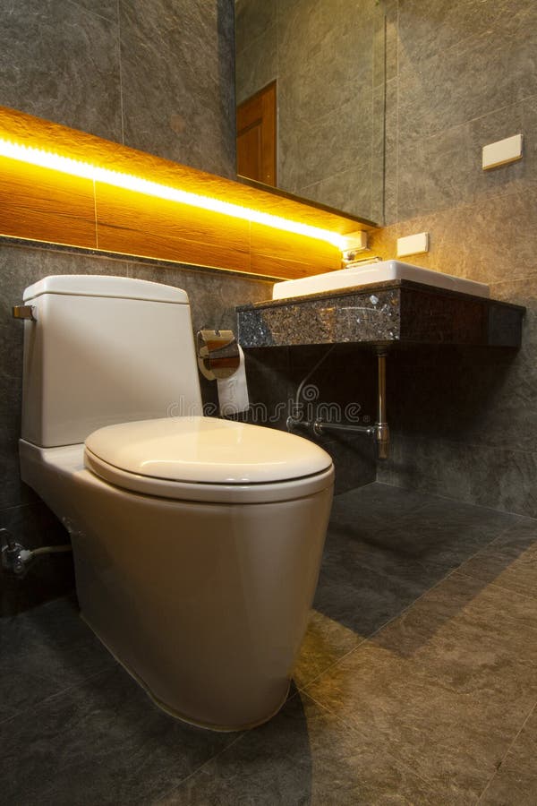 Modern restroom interior stock photo. Image of lavatory - 150609382