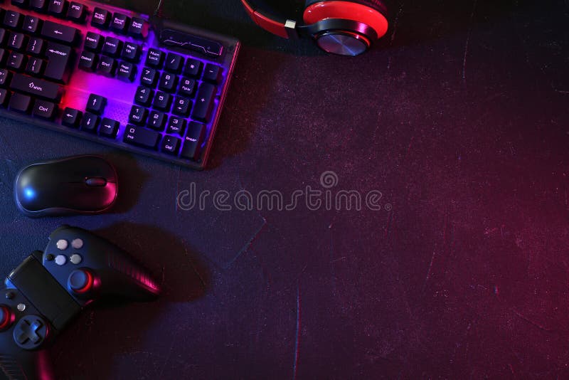 Modern RGB Keyboard, Mouse and Video Game Controller on Table, Flat Lay ...