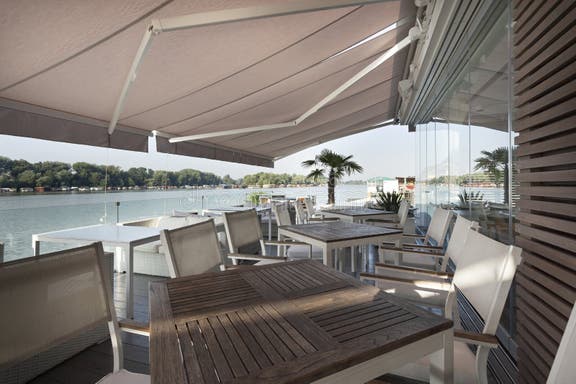 Modern Riverside Cafe Terrace in the Morning Stock Photo - Image of ...