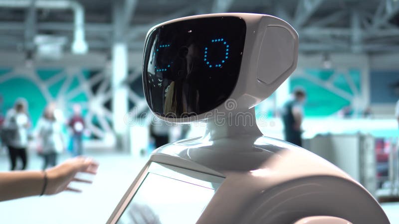 Modern Robotic Technologies. the Robot Looks at the Camera at the ...