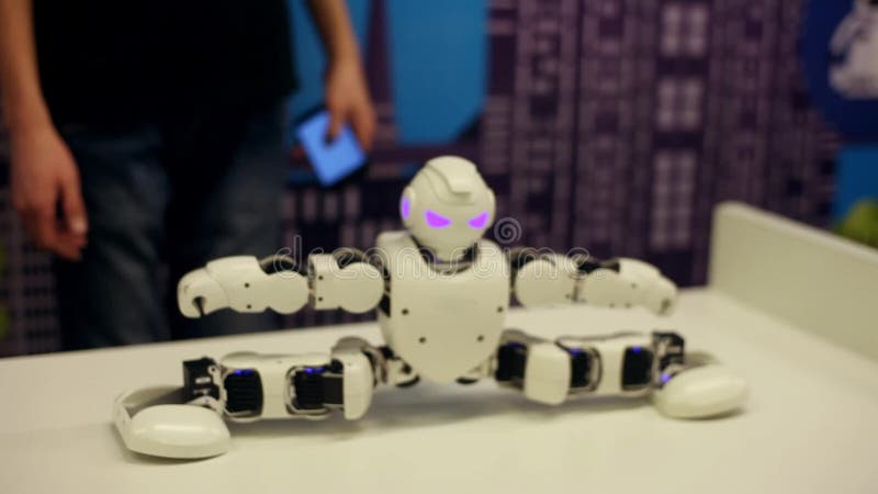 Modern Robotic Technologies. the Robot Sits on the Splits. Stock ...