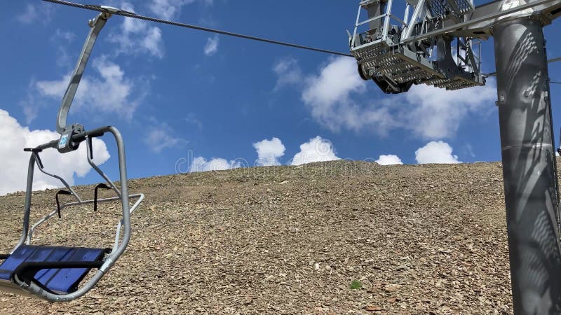Modern Ropeway with Benches in Amazing Mountainous Terrain. Stock ...
