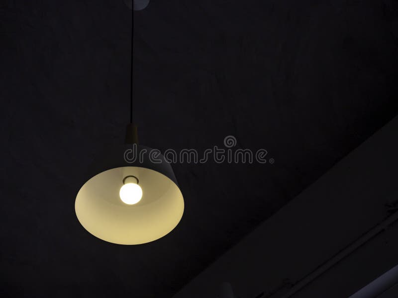Modern Round Ceiling Light with Light Bulb Hanging from Concrete ...