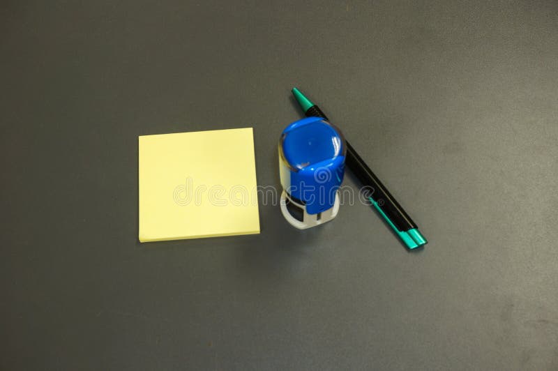 Modern Round Rubber Stamp, Yellow Sticky Memo Pad and Pen Stock Image ...