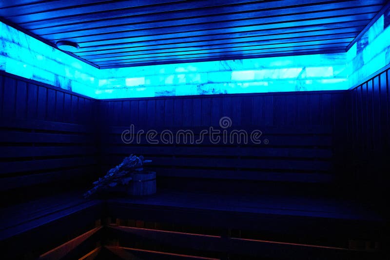 A Modern Sauna with Blue Lighting and Wooden Walls Stock Image - Image ...