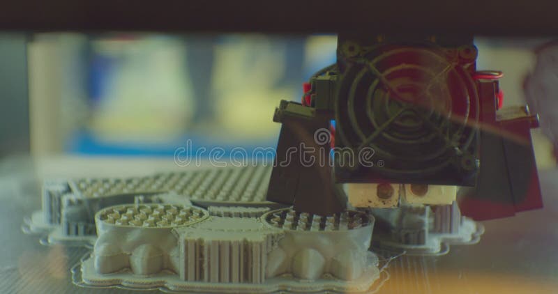 Modern Science and Technology. a 3D Printer Prints a Complex Plastic ...