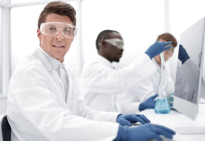 Modern Scientist Sitting in Front of a Computer Monito Stock Photo ...