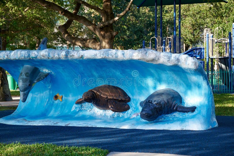 Modern Sculpture of a Wave with Sea Animals in a Park Stock Photo ...