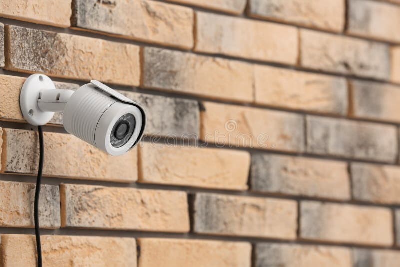 Security CCTV Camera on Brick Wall Stock Photo - Image of lens ...