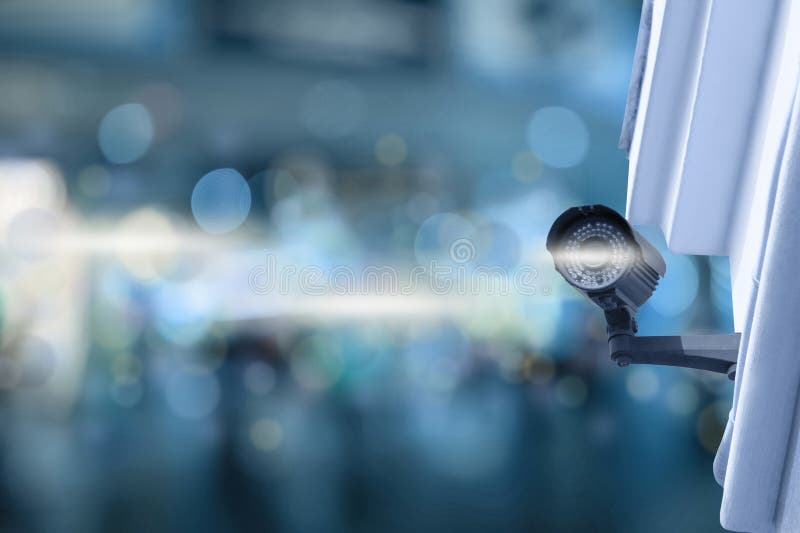 Modern Security CCTV Camera on Building Wall Outdoors, Space for Text ...