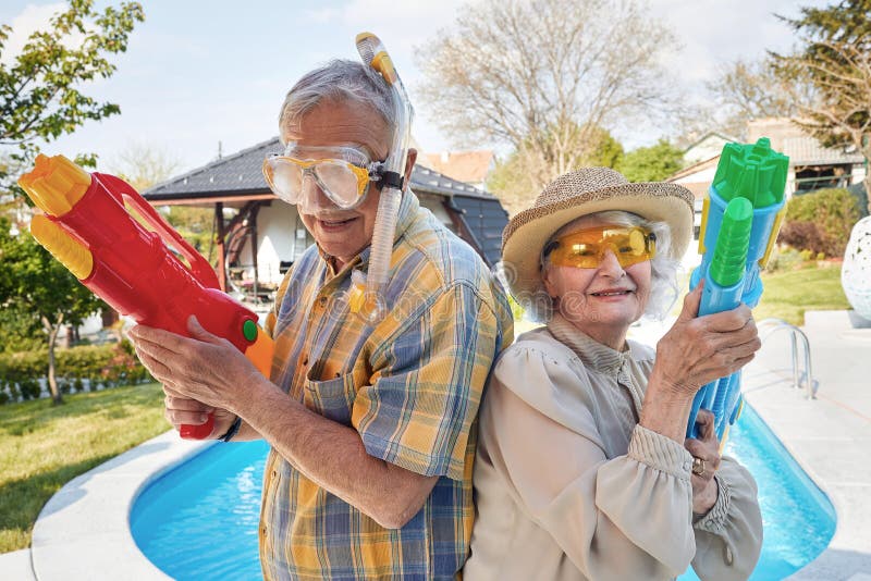 Modern Senior People Have Fun Playing with Water Gun Stock Image ...