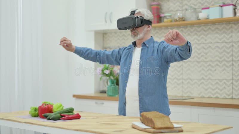 Modern Old Woman Using VR Set while Standing in Kitchen Stock Image ...