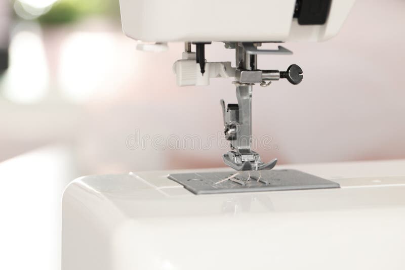 Modern Sewing Machine in Atelier, Closeup View Stock Image - Image of ...