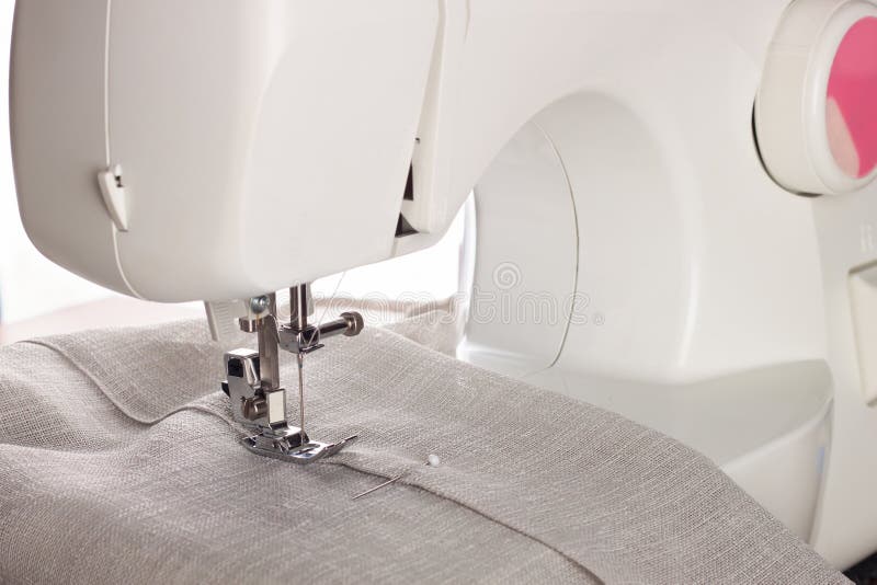 The Modern Sewing Machine and Item of Clothing Stock Photo - Image of ...