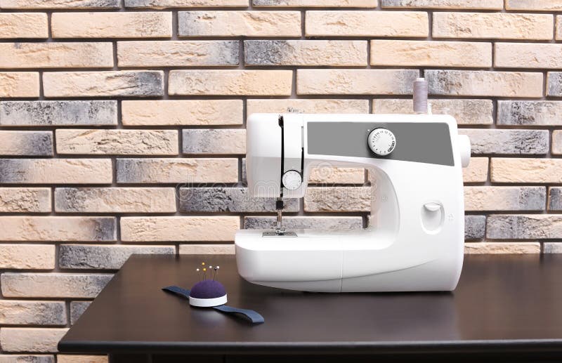Modern Sewing Machine on Table Stock Image - Image of creative, fashion ...