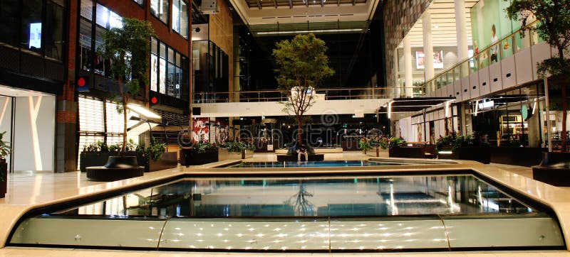 Modern Shopping Mall with Trees and Water Inside Stock Image - Image of ...