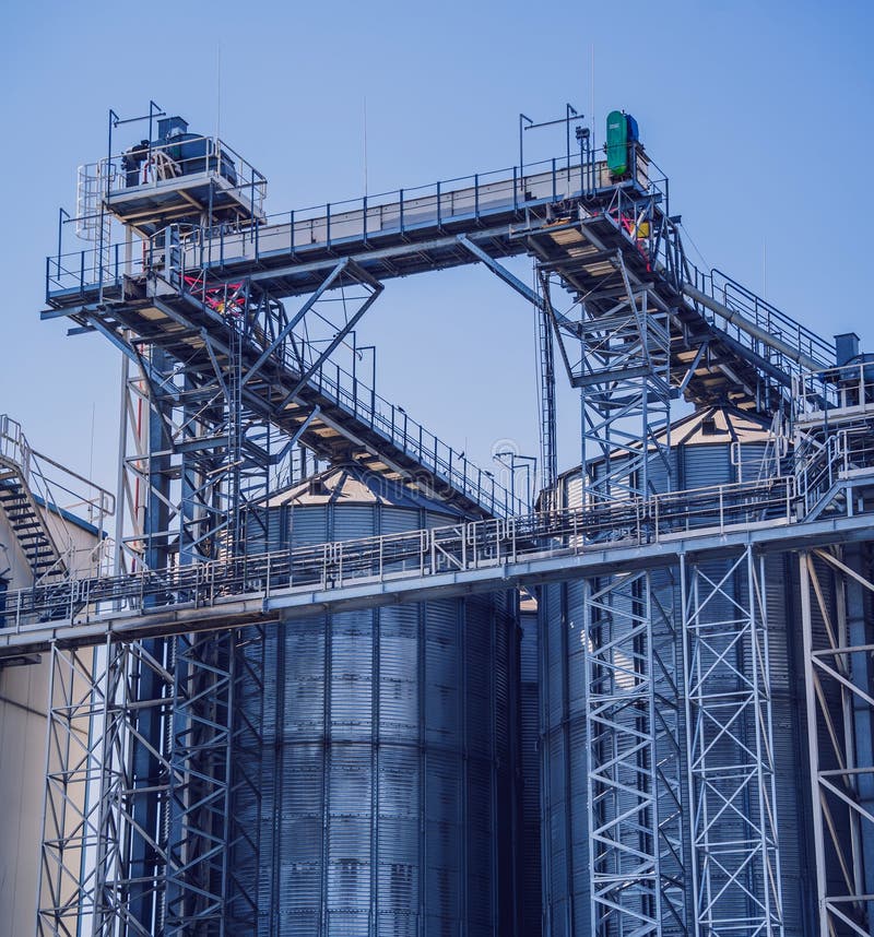 Modern Silos for Storing Grain Harvest at the Blue Sky Background ...