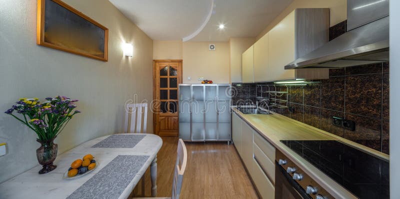 Modern Simple Interior of Kitchen. White Table and Chairs. Sink and ...