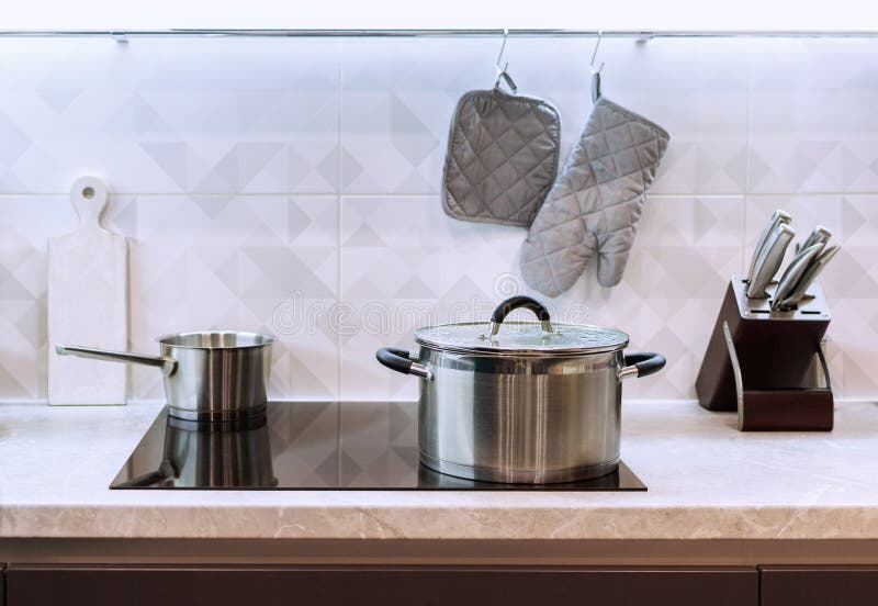 Modern Kitchen with Table and Built-in Hob. Stock Image - Image of ...
