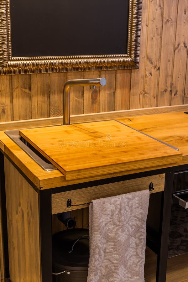 Modern Sink in a Wooden Kitchen in the Interior. Stock Image - Image of ...