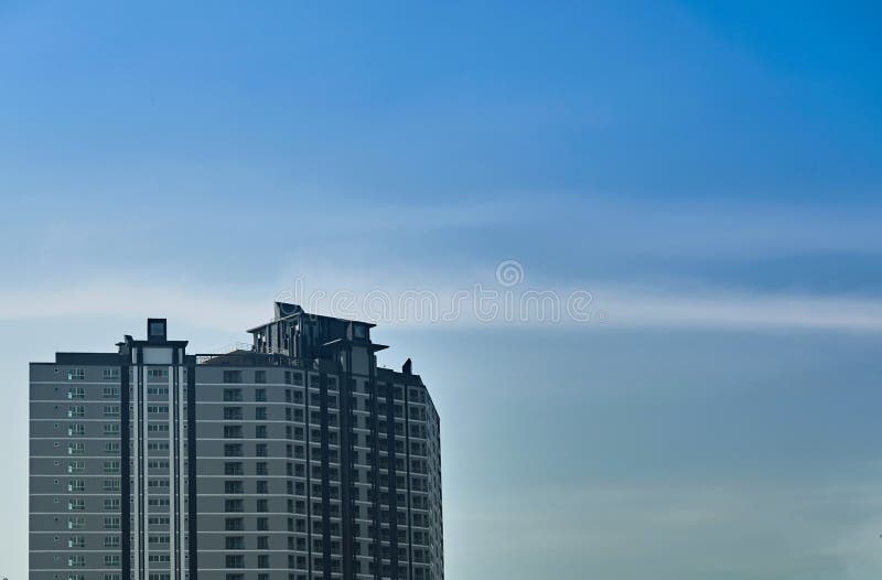 Modern Skyscaper on Blue Sky Background with Copyspace Editorial Photo ...