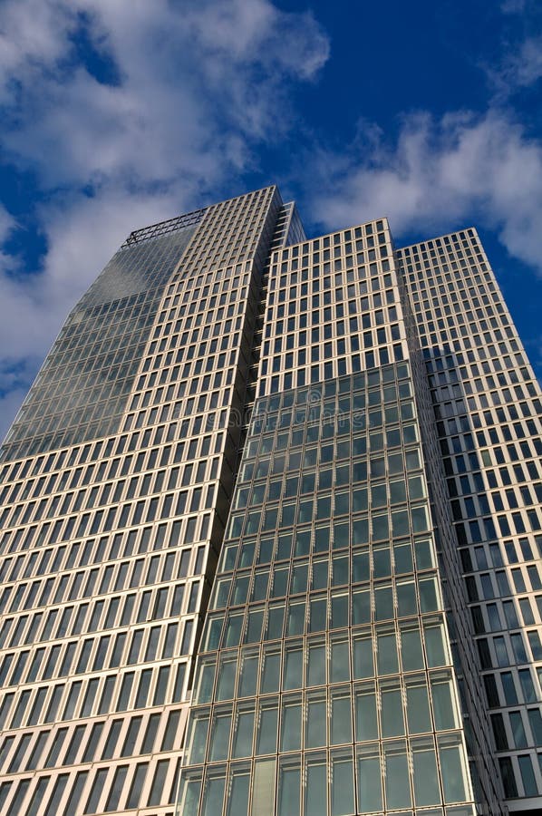 Modern Skyscraper Building with Clouds Stock Image - Image of blue ...