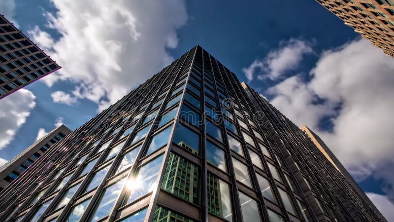 Modern Skyscraper with Reflective Glass Windows and Cloudy Sky, Urban ...