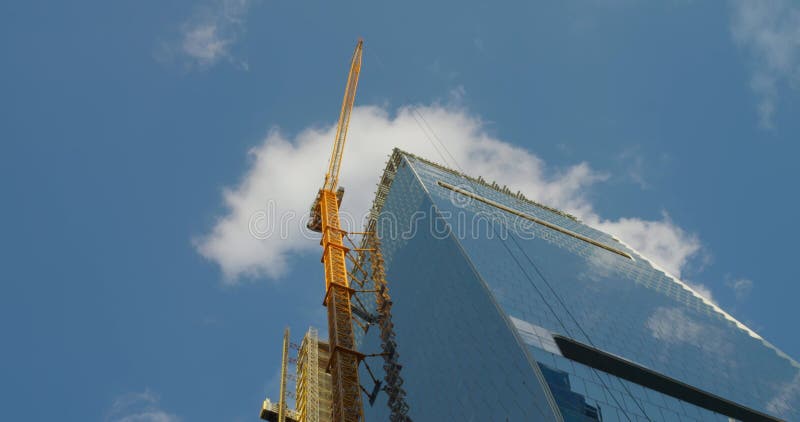Modern Skyscraper Under Construction Against Clear Blue Sky. Tower ...