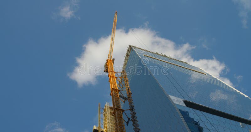 Modern Skyscraper Under Construction Against Clear Blue Sky. Tower ...