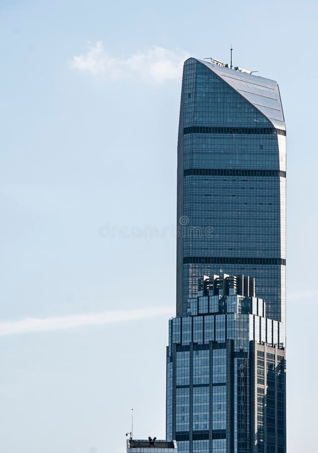 Modern Skyscraper with Unique Design Against Blue Sky Stock Image ...