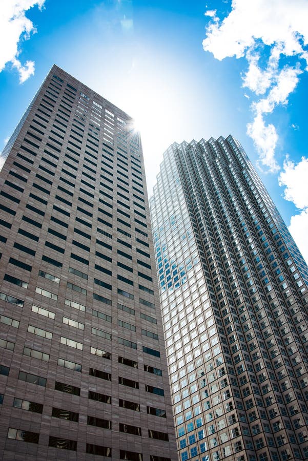Modern Skyscrapers with a Bright Sun Reflection. Stock Image - Image of ...