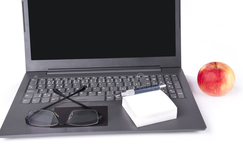 Modern Slim Laptop with Pile of Note Paper and Pair of Glasses Stock ...