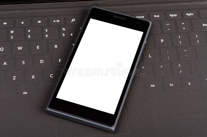 Modern Smart Cell Phone on Flat Keyboard Stock Photo - Image of display ...